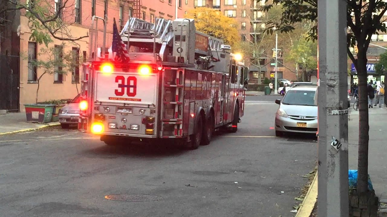FDNY LADDER 30 RESPONDING FROM QUARTERS IN THE HARLEM AREA OF MANHATTAN ...