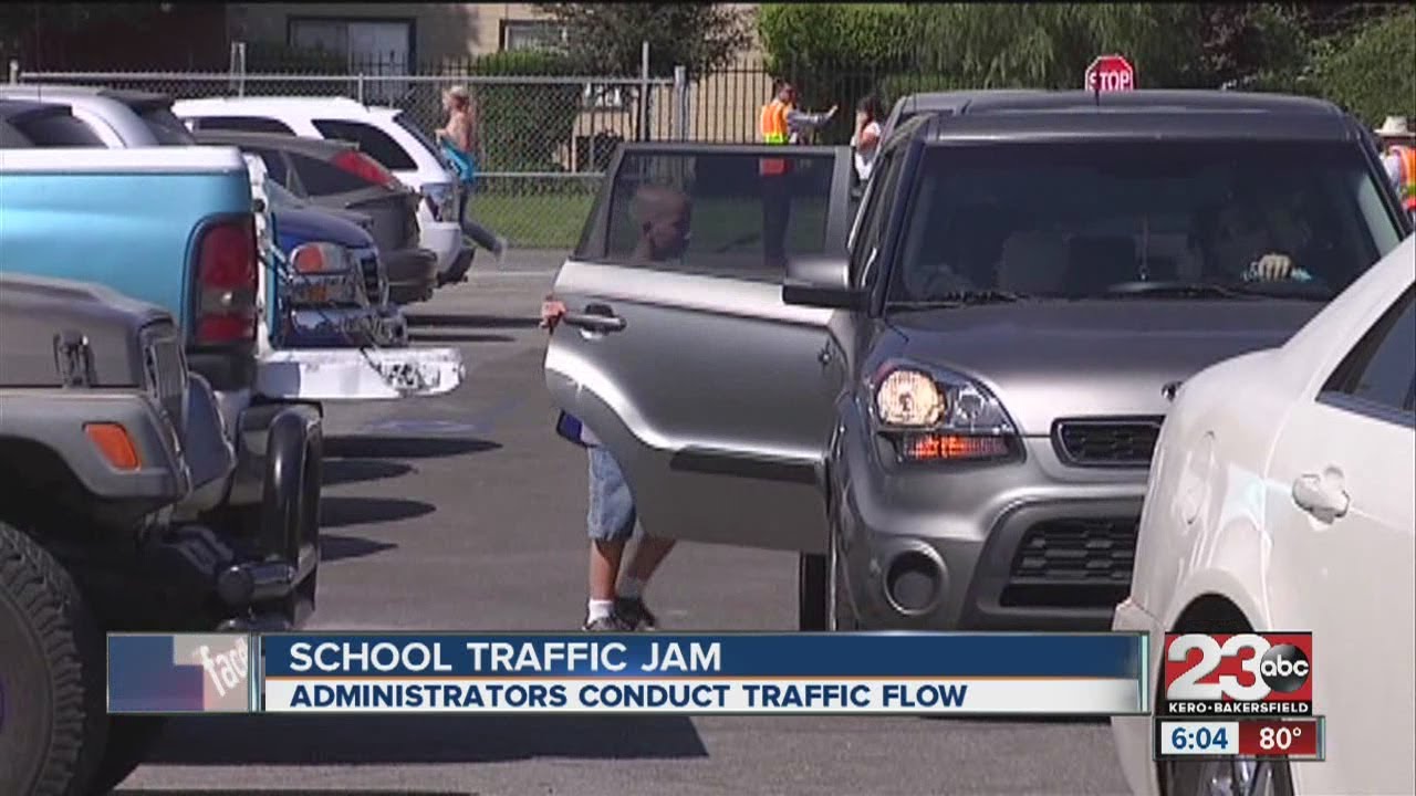Parents cause traffic jam at school - YouTube