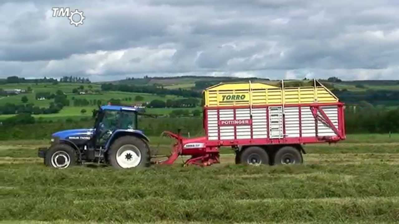 New Holland TM150 & Pottinger Forage Wagon - YouTube