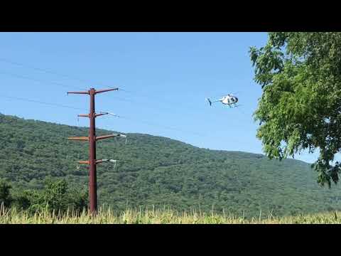 Helicopter pulling electric wire - YouTube