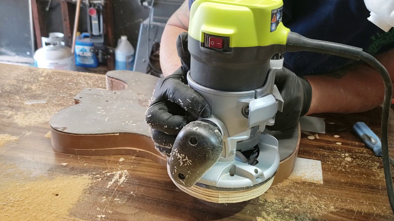 Routing a guitar body. - YouTube