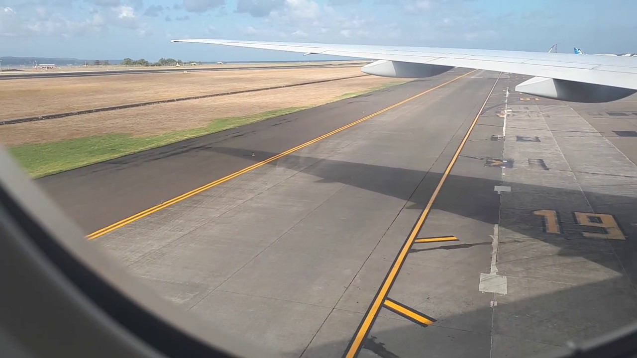 Qatar Airways Boeing B777 wing view departure from Denpasar Bali - YouTube