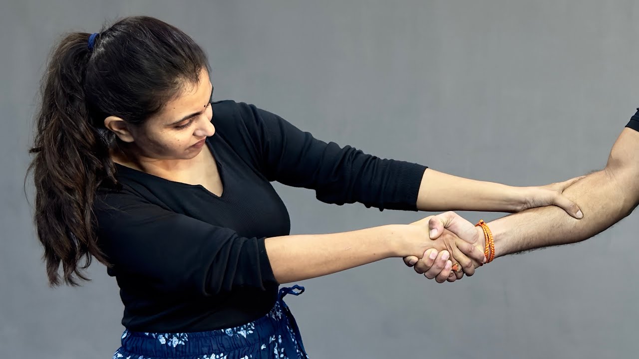 How to defend yourself from aggressive handshakes - YouTube