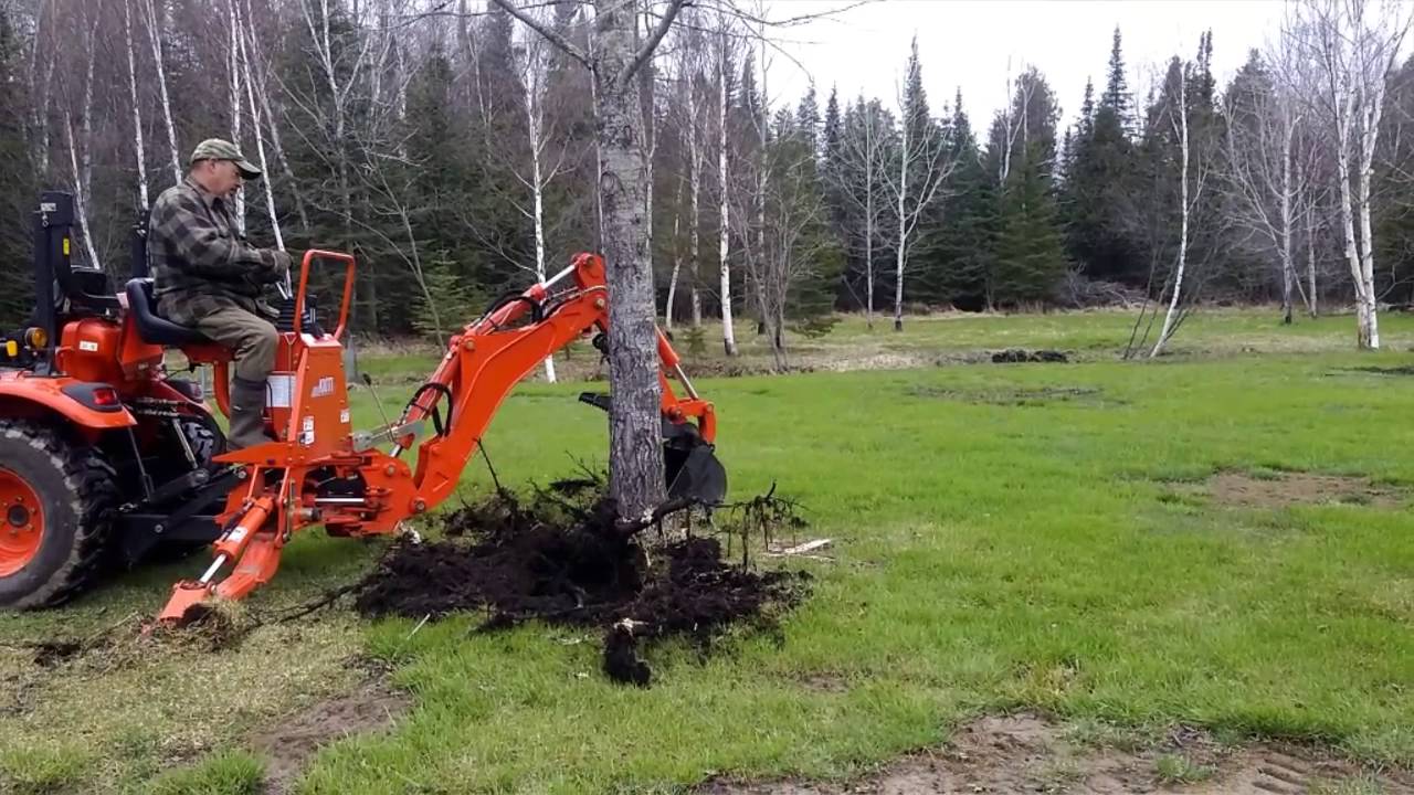 Kioti CK2510 and backhoe vs tree - YouTube