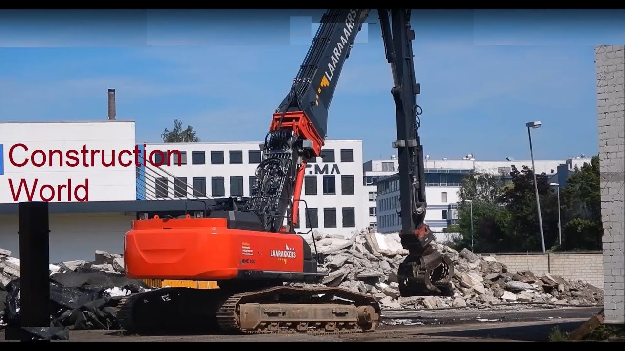 Excavator Hitachi 350 KMC 400 demolition site - YouTube