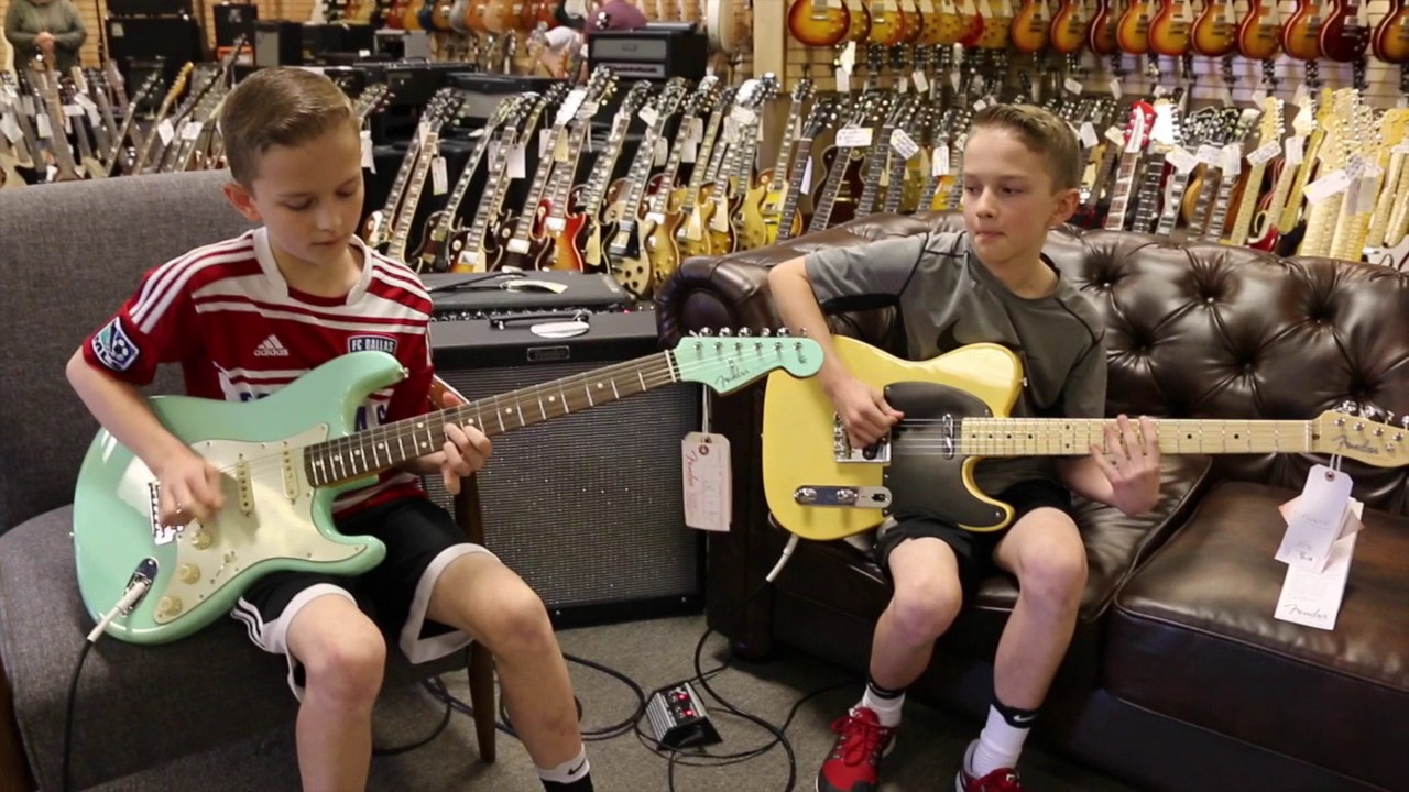 13-Year-Old Twins: Zane and Noah Stanley playing a Fender Stratocaster ...