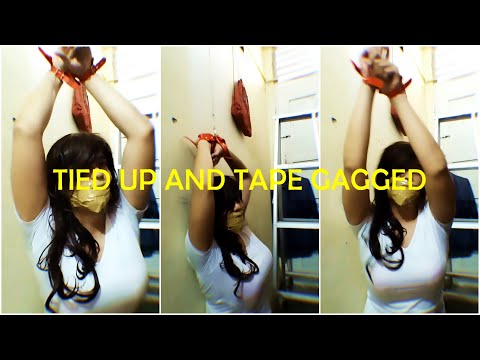 CD With Hands Tied Up and Tape Gagged