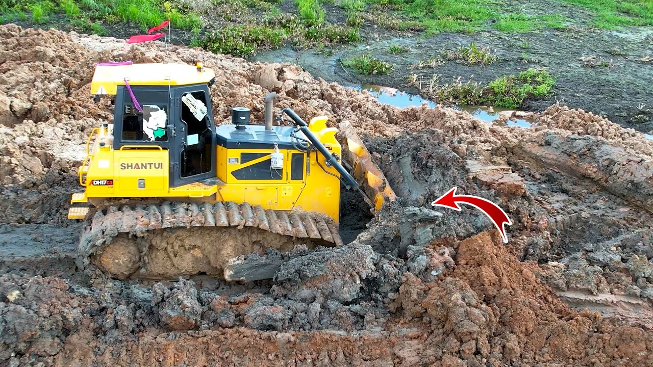Great Working Bulldozer Pushing in Mud with Dump Truck Transport Soil ...