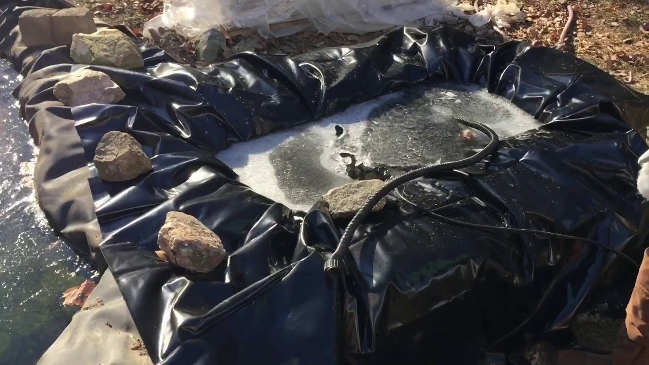 Preparing the pond for very cold temperatures! - YouTube