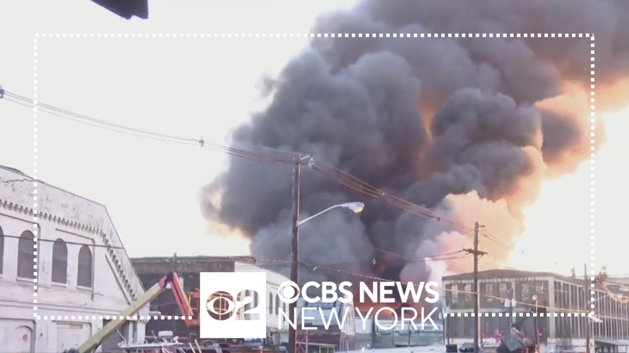 Elizabeth warehouse fire sends thick smoke into sky - YouTube