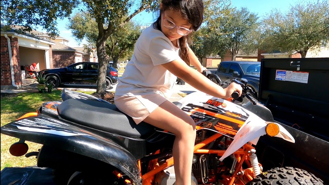 Working on a 4 wheeler with the neighbor kid. - YouTube
