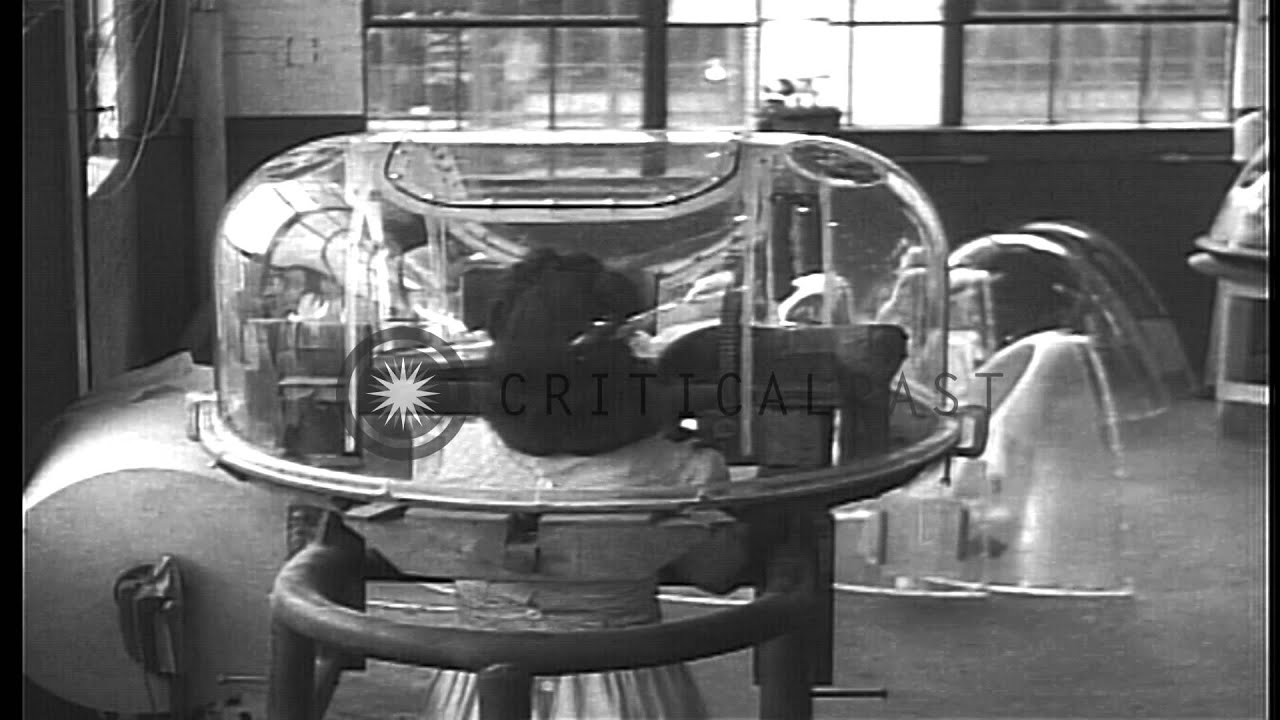 Assembling transparent aircraft gun turrets in a manufacturing plant in ...