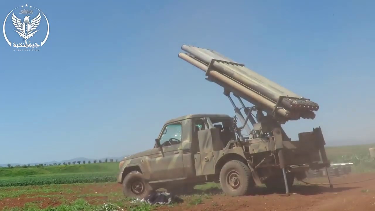 14 charging MLRS rockets from the Grad based on the pickup Toyota - YouTube
