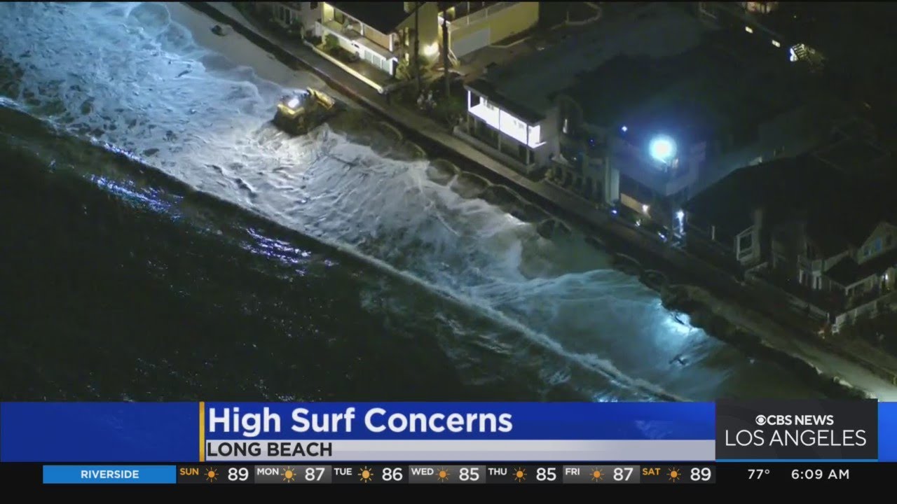 Crews work to block potential flooding in Long Beach amid high tide ...