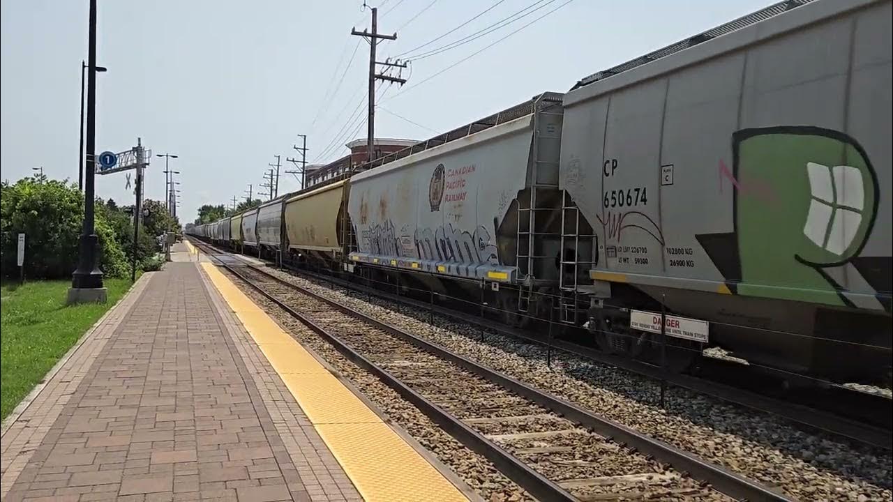 NS #4218 GE AC44C6M leading CPKC Grain Train at Northbrook Station #cpkc #norfolksouthern - YouTube