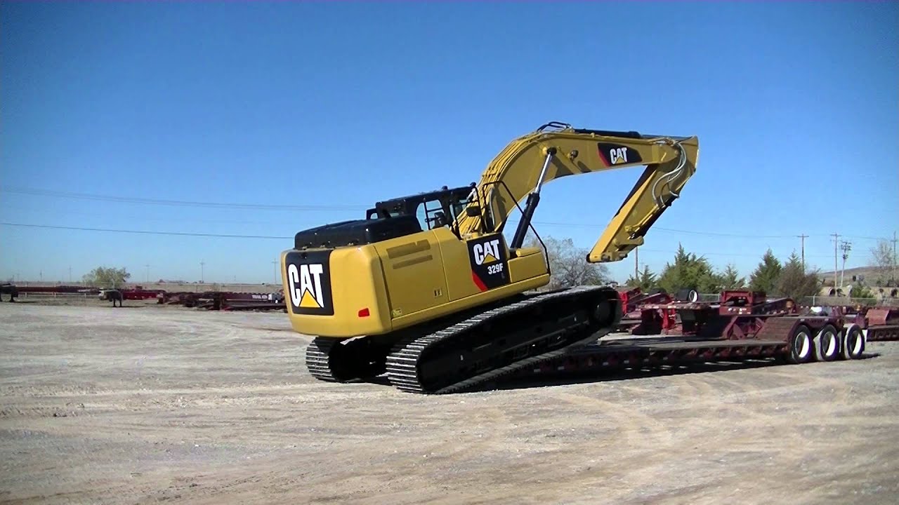 12 3 2015 Loading a Caterpillar 329F Excavator Edit - YouTube