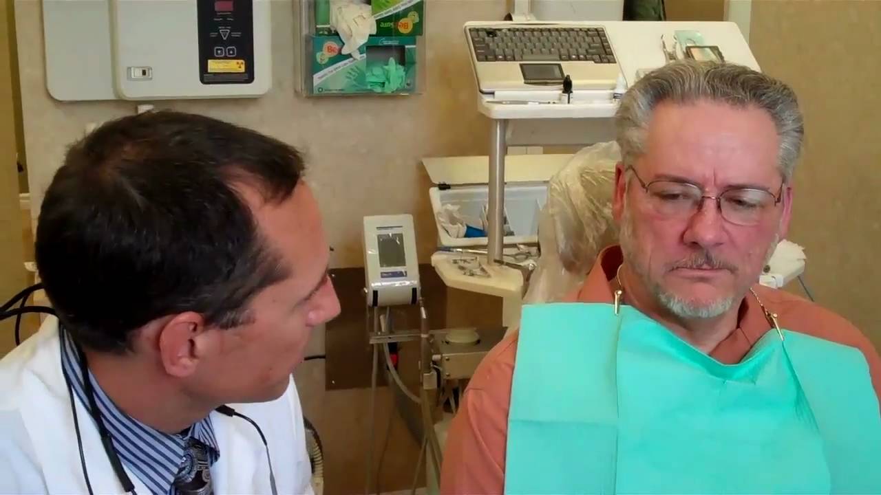 Laser removal of benign growth in the cheek - YouTube