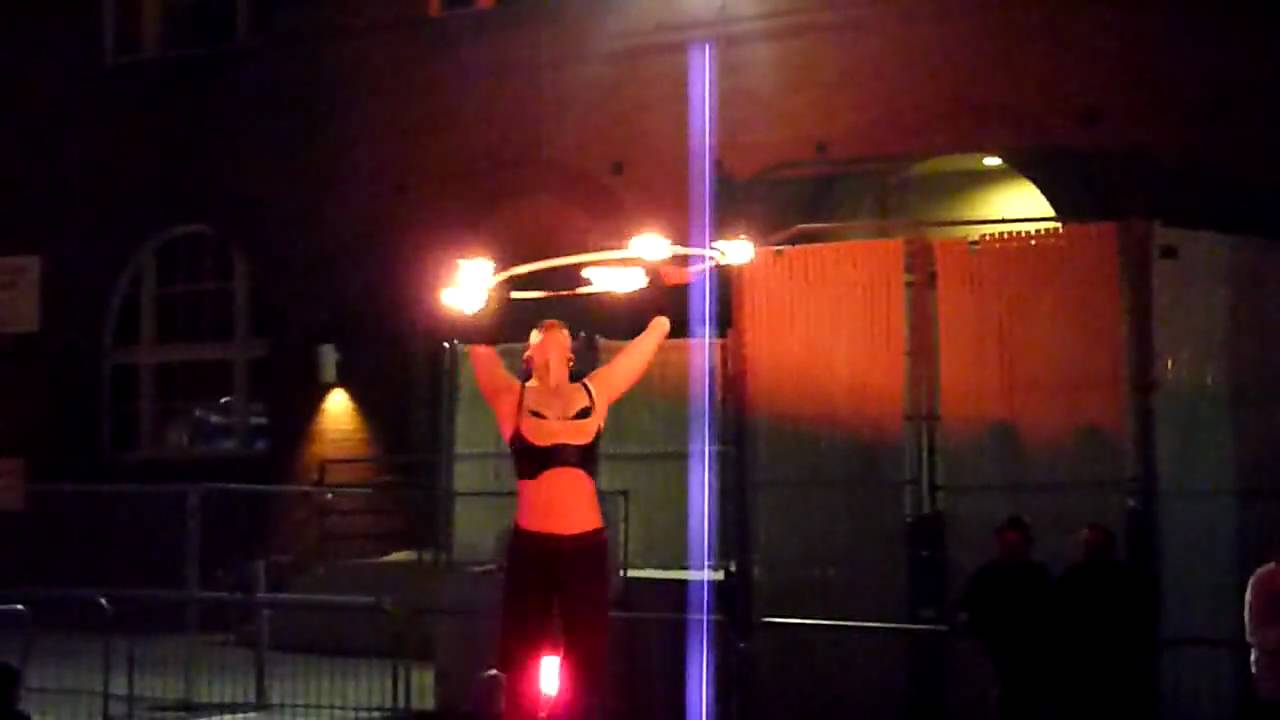 Spiral performs with flaming hoops - YouTube