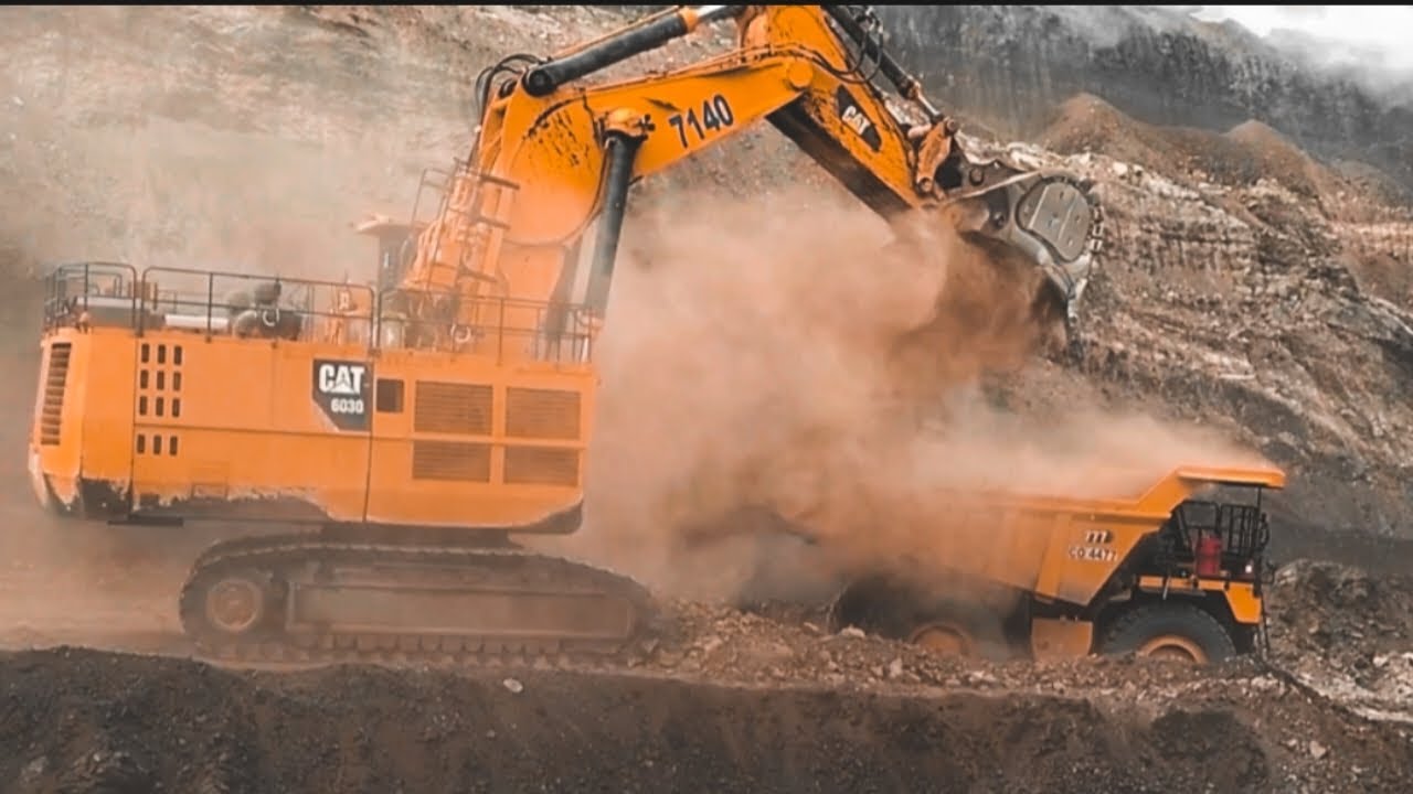 Caterpillar 6030 excavator and truck cat 777 - YouTube