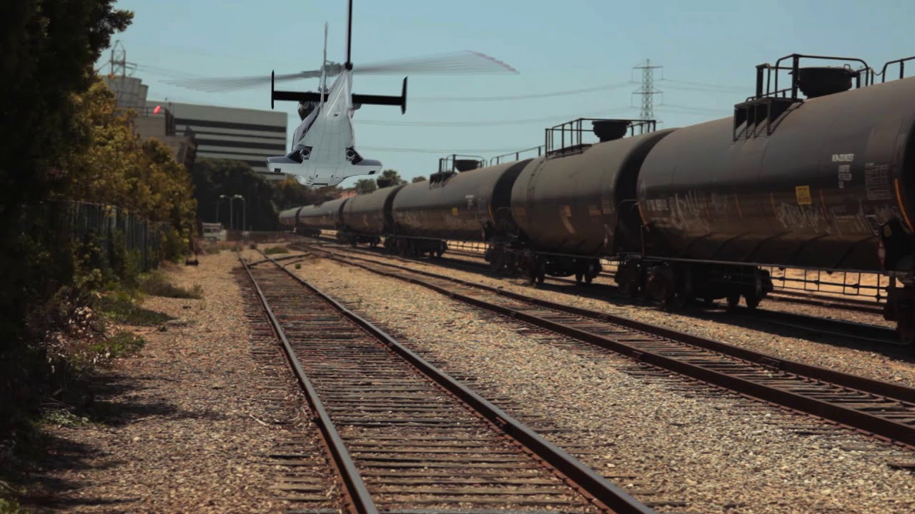 Airwolf helicopter flying along railroad tracks - YouTube