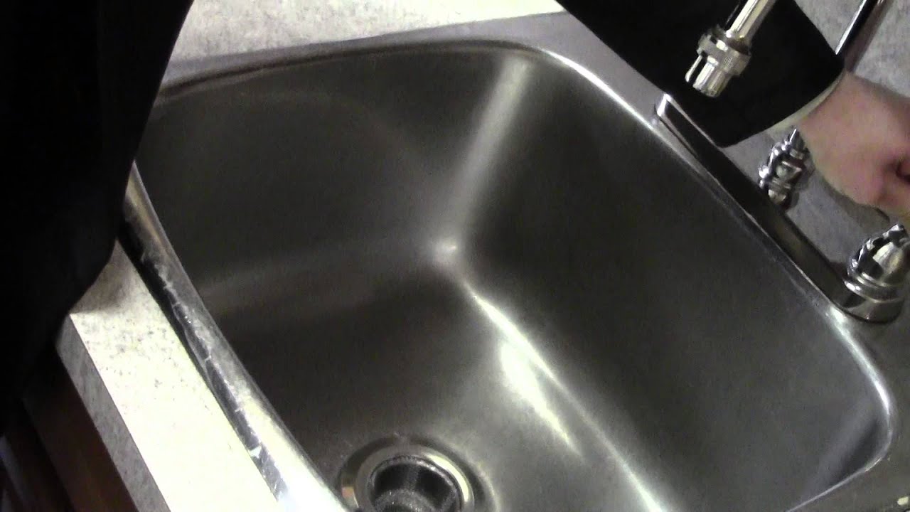 Koshering the Kitchen for Pesach Sink Part b - YouTube