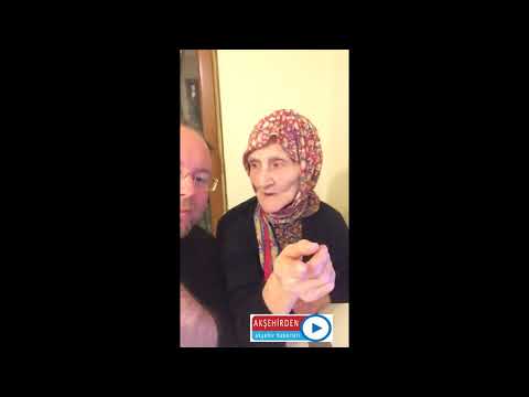 Akıllı cep telefonda ilk kez kendinin gören ninenin komik şaşkınlığ