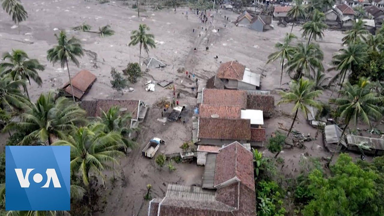 Indonesian Village Covered in Ash Following Volcanic Eruption - YouTube