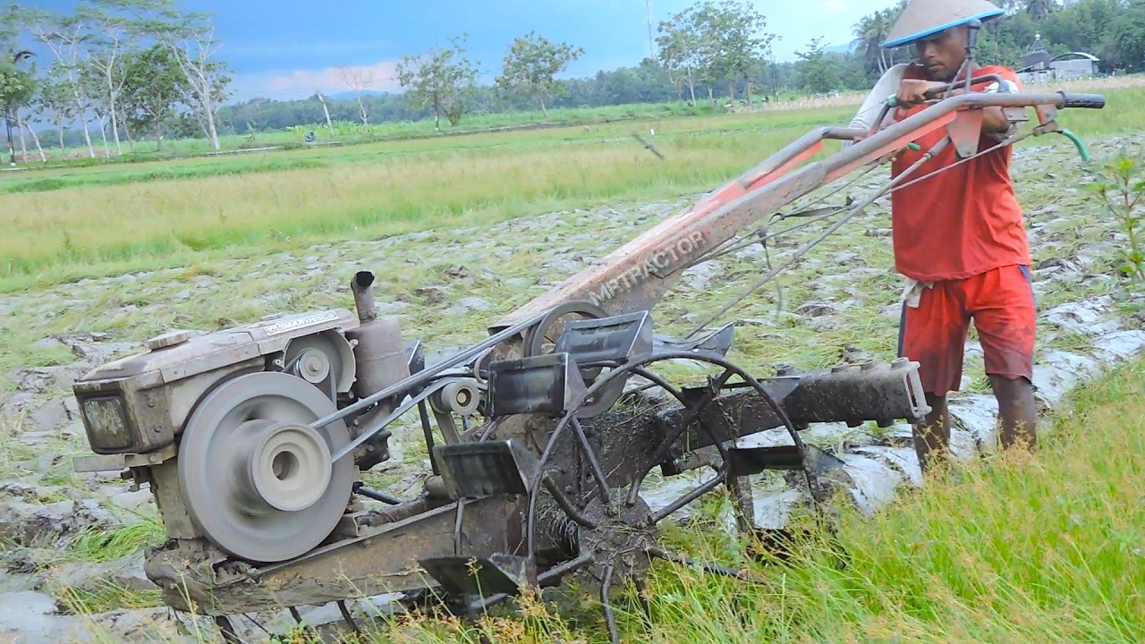 Ploughing Dirt Till Finish Using A Hand Tractor - YouTube