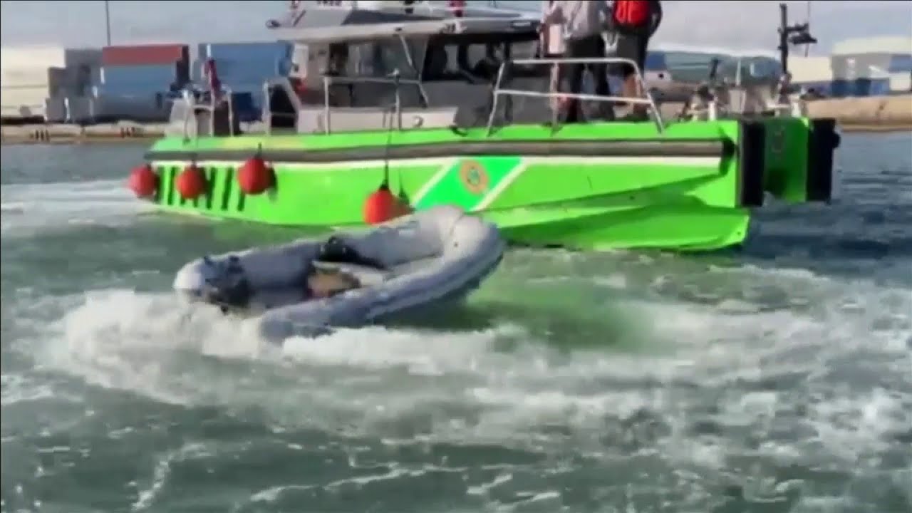 Rescue workers help gain control of out of control boat - YouTube