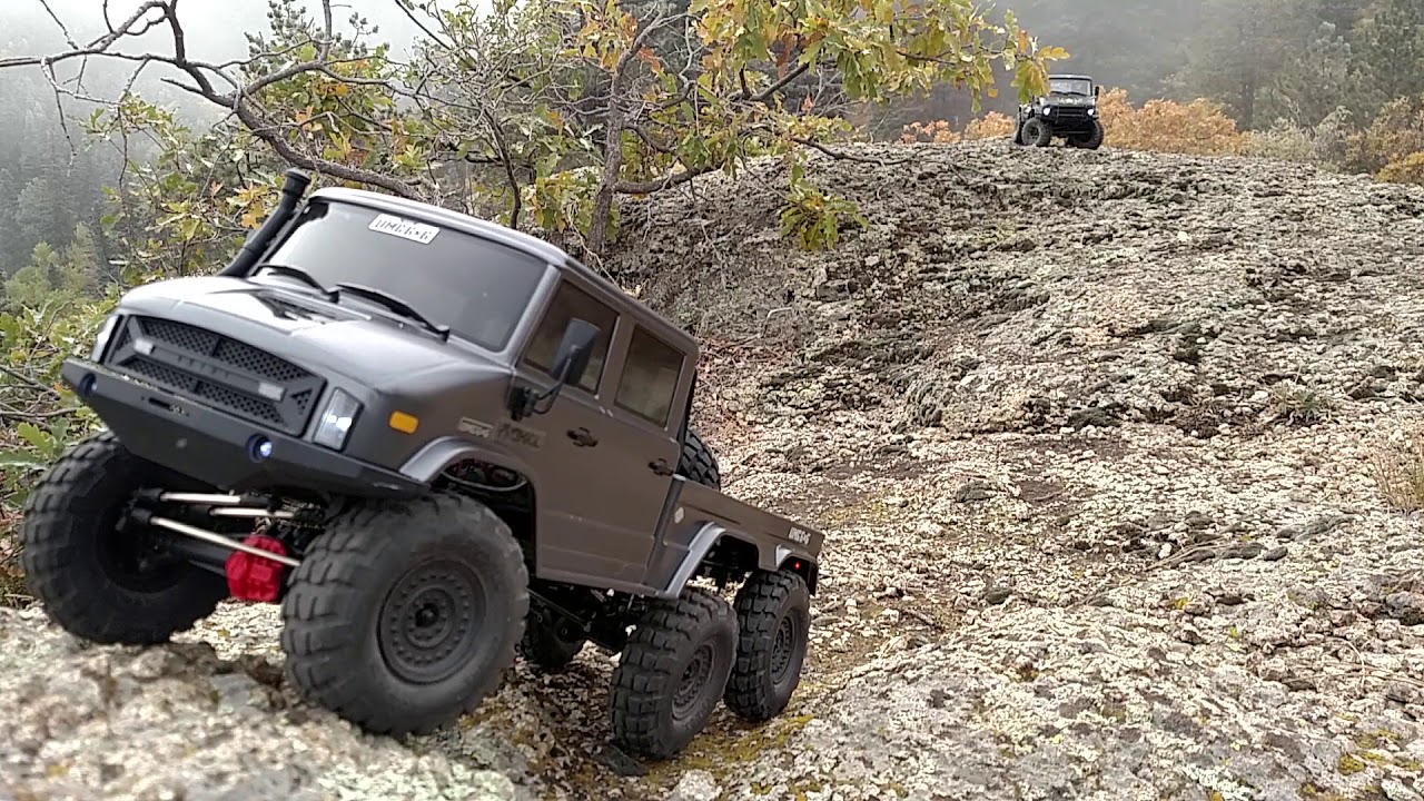 Axial UMG10 6x6 and Axial UMG10 doing a slow fall crawl in mountains ...