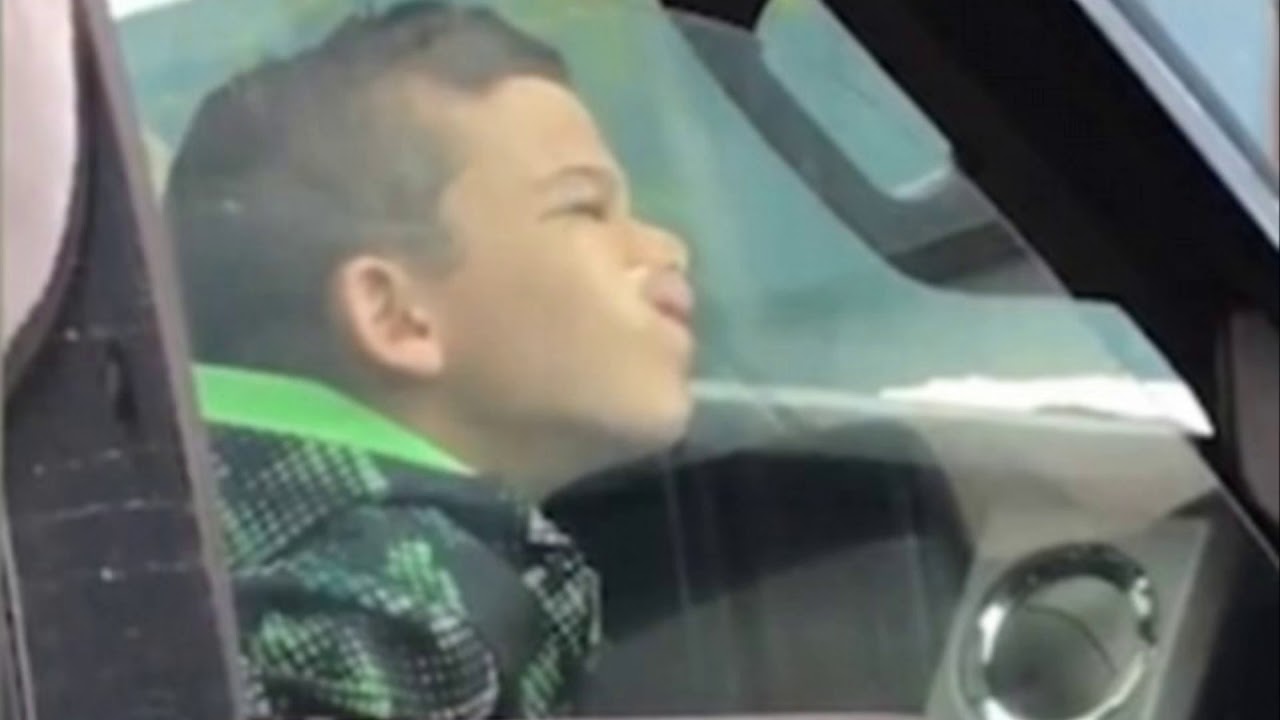 Bored boy filmed pressing his face against a car window - YouTube