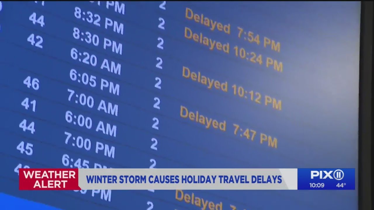 Winter storm causes holiday travel delays - YouTube