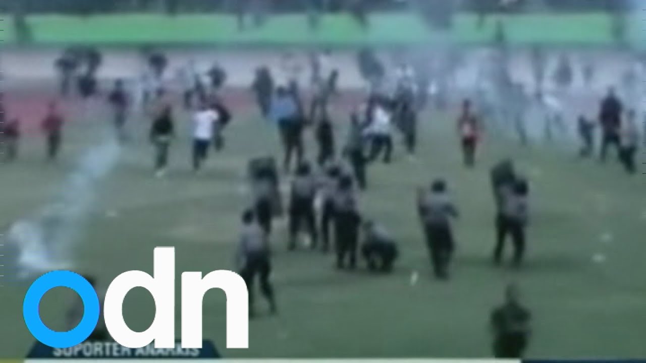 One killed, dozens injured in Indonesian football riot - YouTube