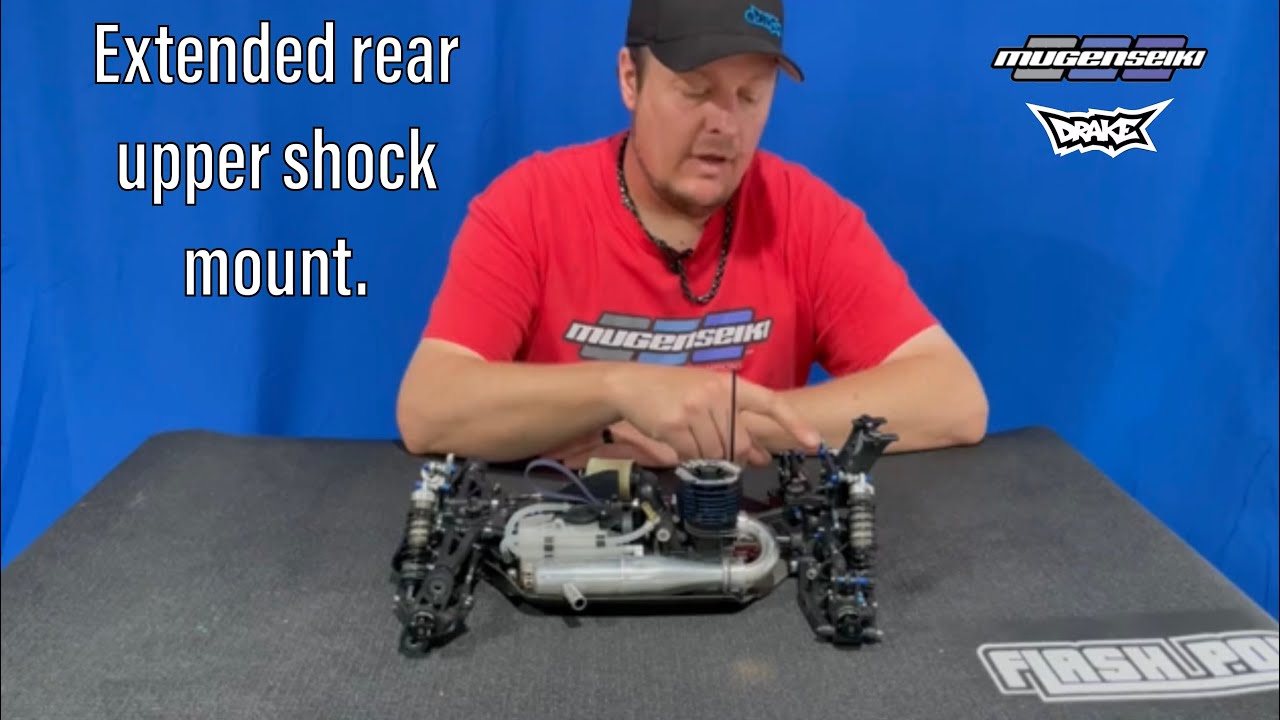 Extended rear upper shock mount. - YouTube