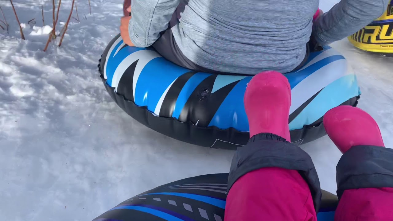 Donut sled down hill - YouTube