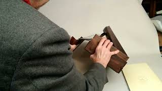 Walnut pop-up display box 2. Patent No. 11,166,552.