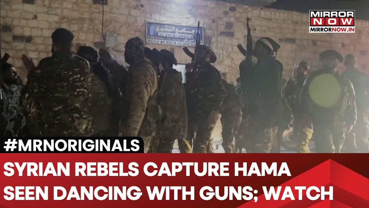 Syrian Rebels Dance With Guns, Celebrate After Capturing Hama From Al ...