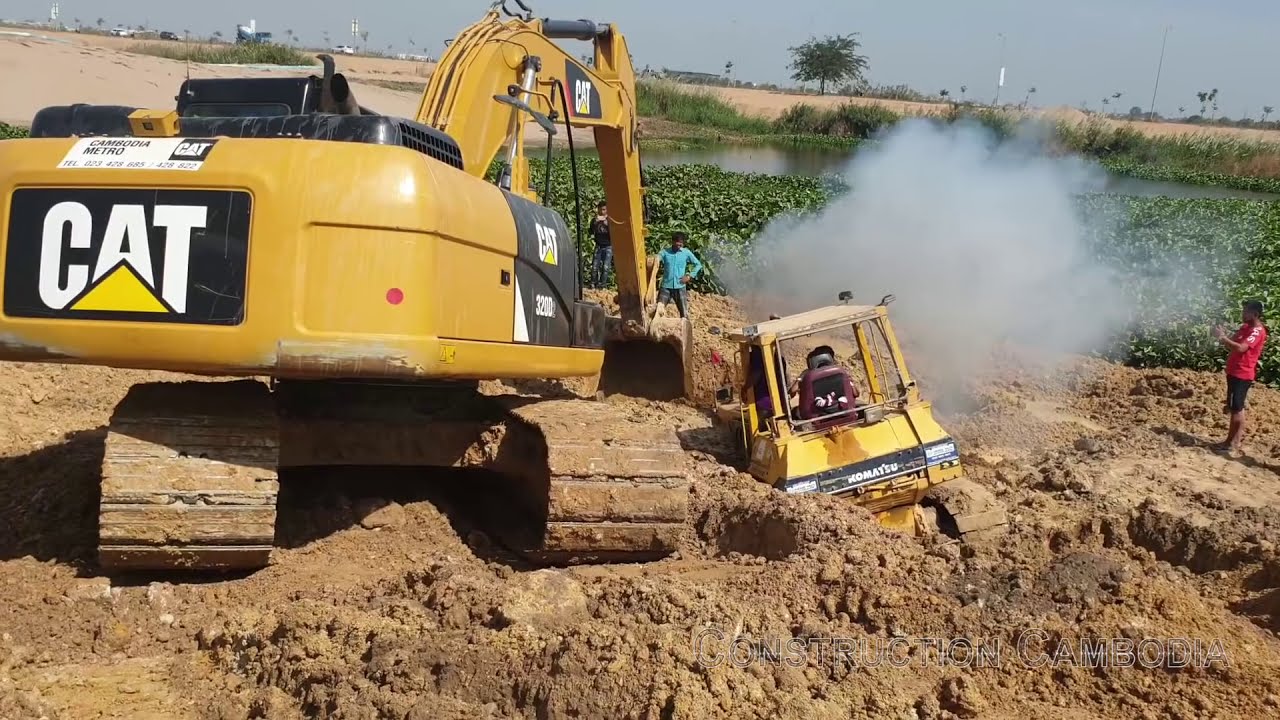 Bulldozer stuck in deep mud & recovery by Excavator - YouTube