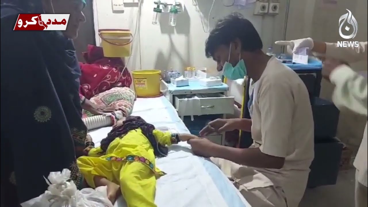 Dengue out of control in flood-hit Badin | Aaj News - YouTube