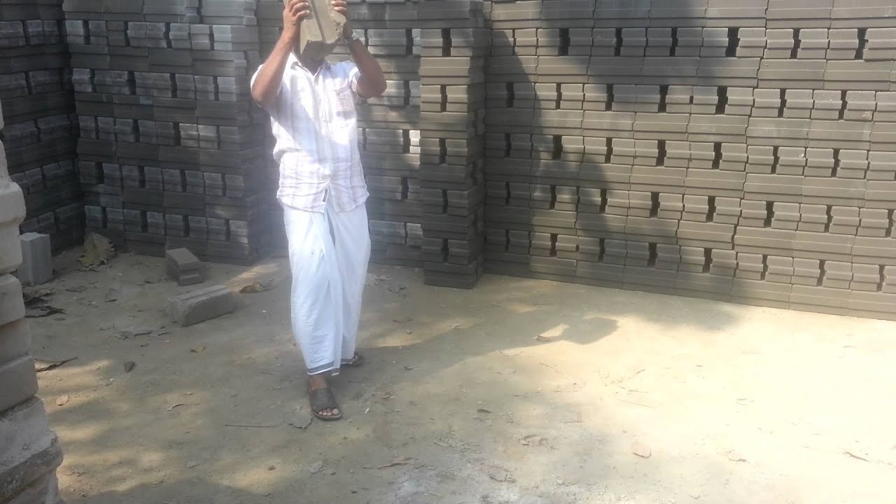 Fly ash based interlocking bricks irumbuzhi - YouTube