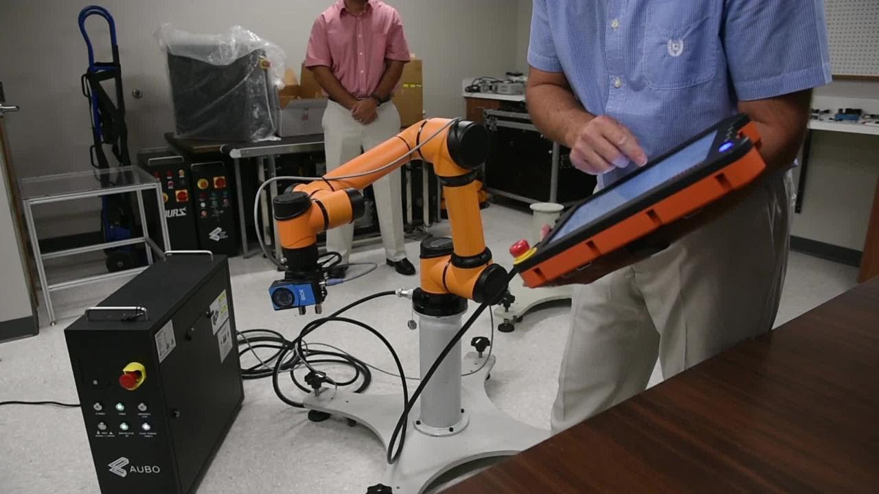 Watch a robot created by AUBO Robotics in action - YouTube