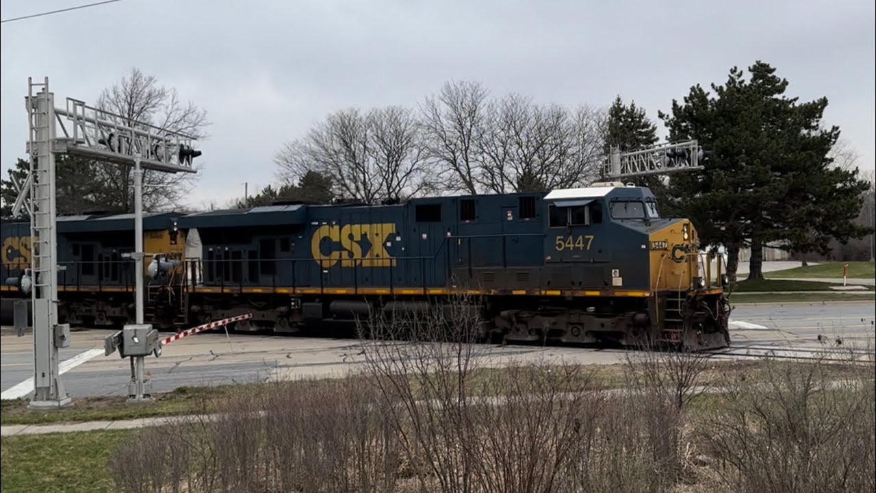CSX #5447/CSX #5460 Leading L303 with 68 cars on a WINDY day in ...