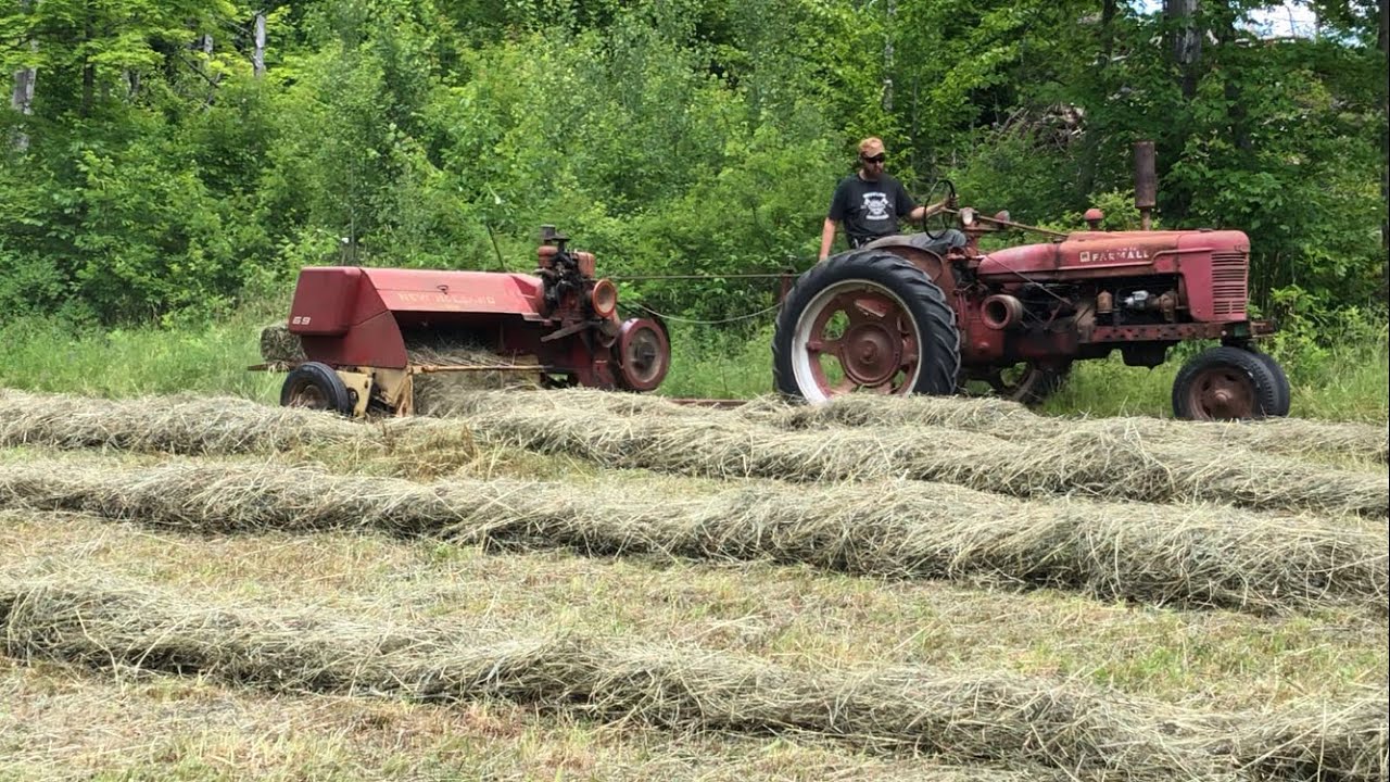 Old school haying with farmall H and new holland equipment - YouTube