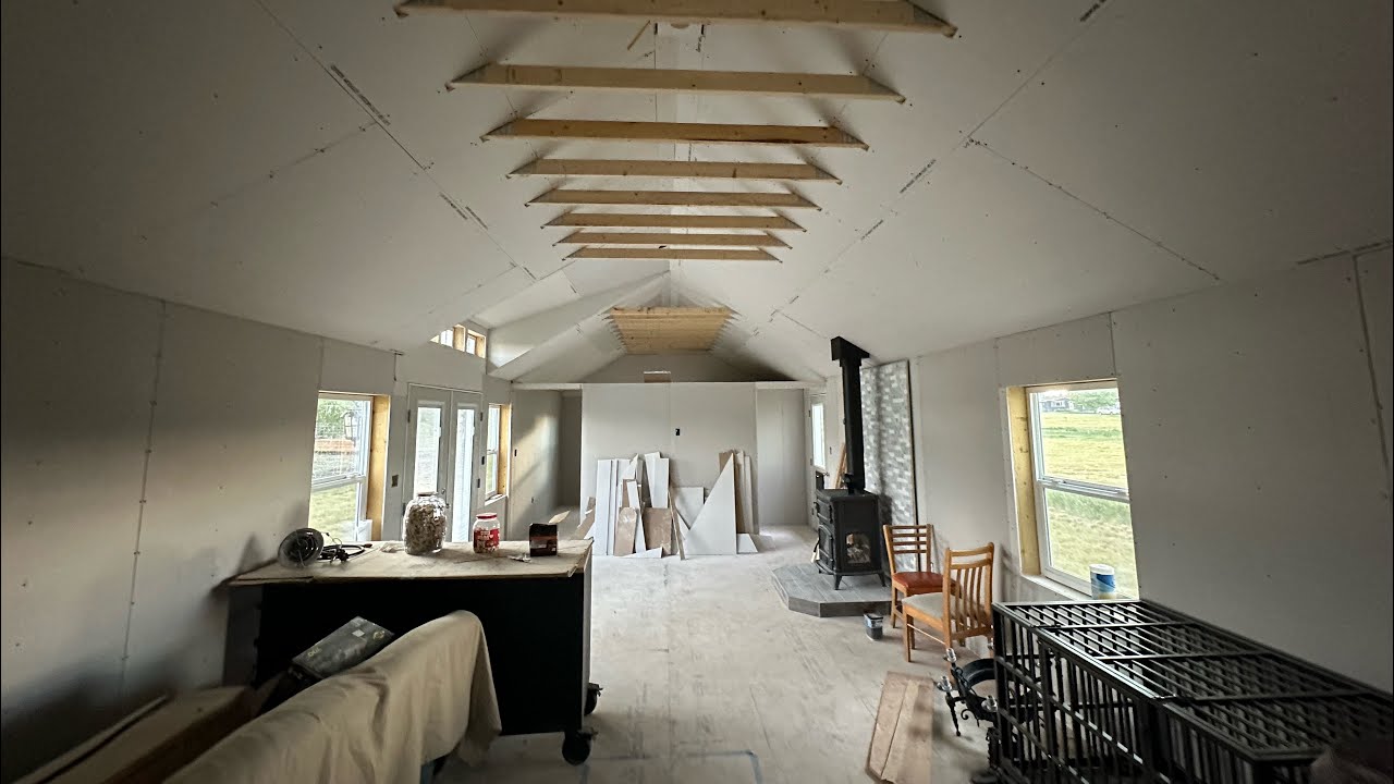 Dry wall complete on the shed to house - YouTube