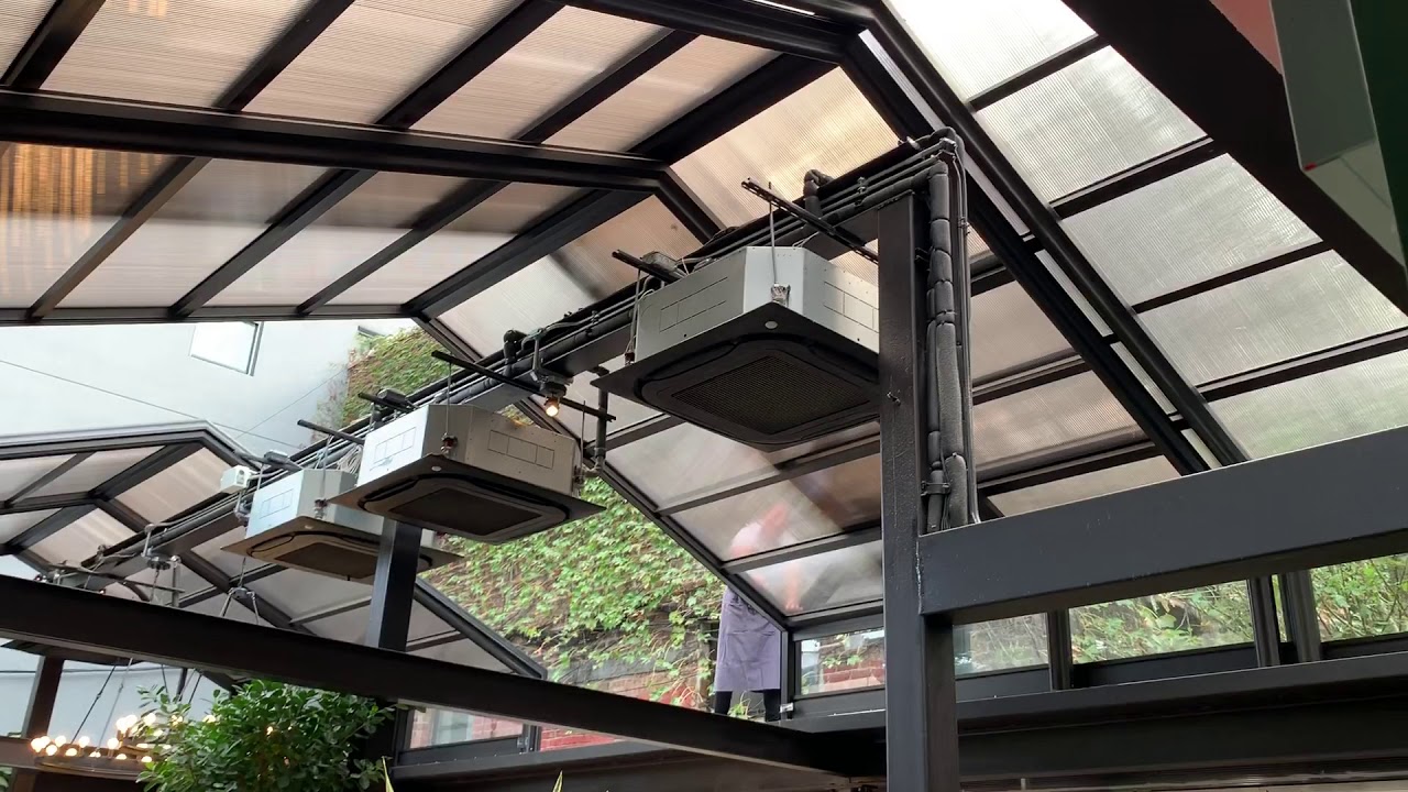 Roll-A-Cover's Retractable Roof at Montesacro, Brooklyn - YouTube