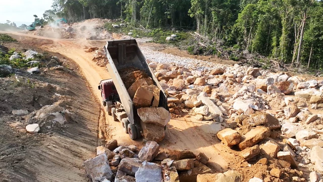 Massive Heavy Stone Unloading Excavator Digging Loading Stone On Dump ...