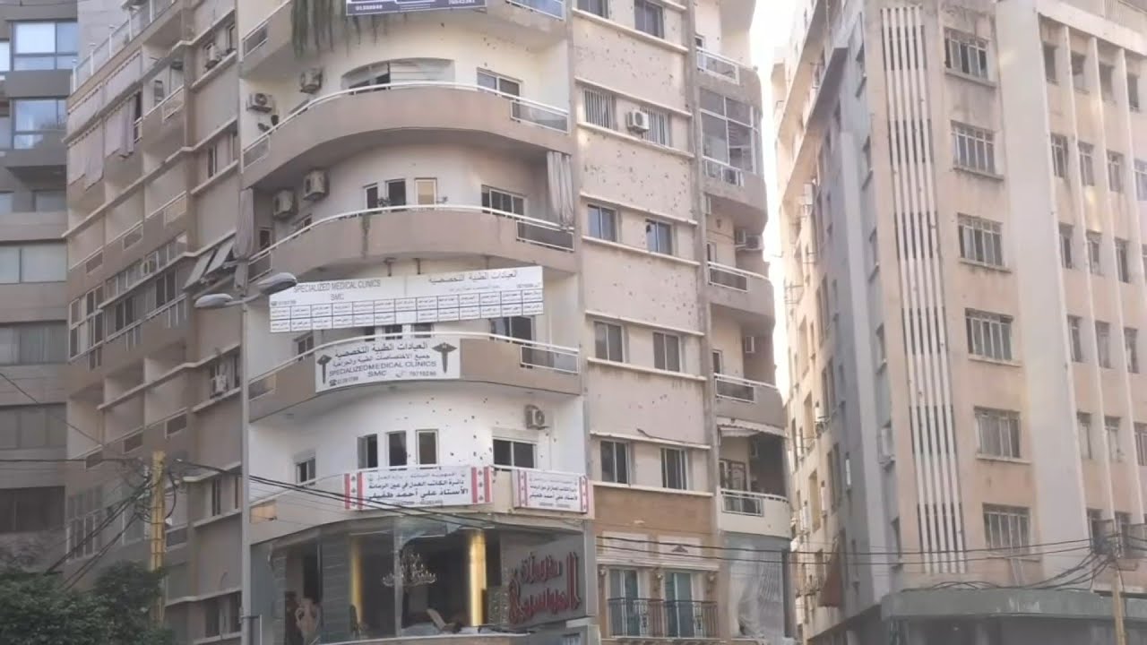 Damages at site after deadly clashes rock Lebanon capital | AFP - YouTube
