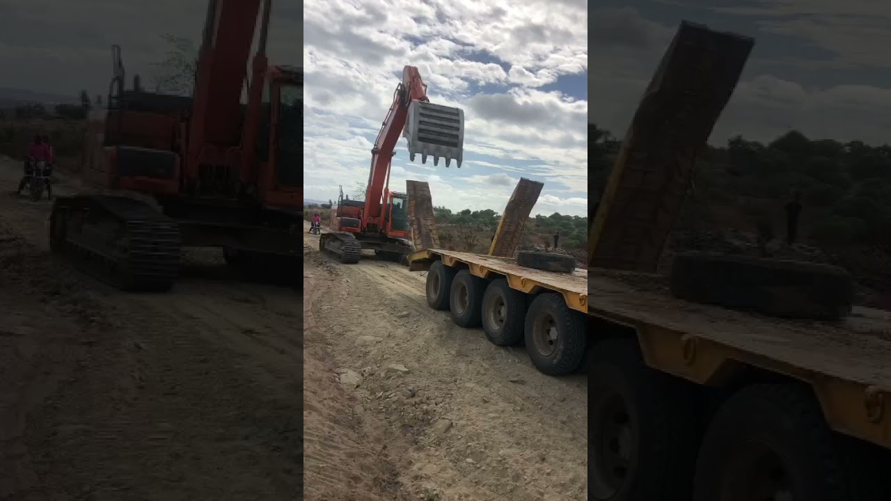 how to load excavator machine on a lowloader.. - YouTube