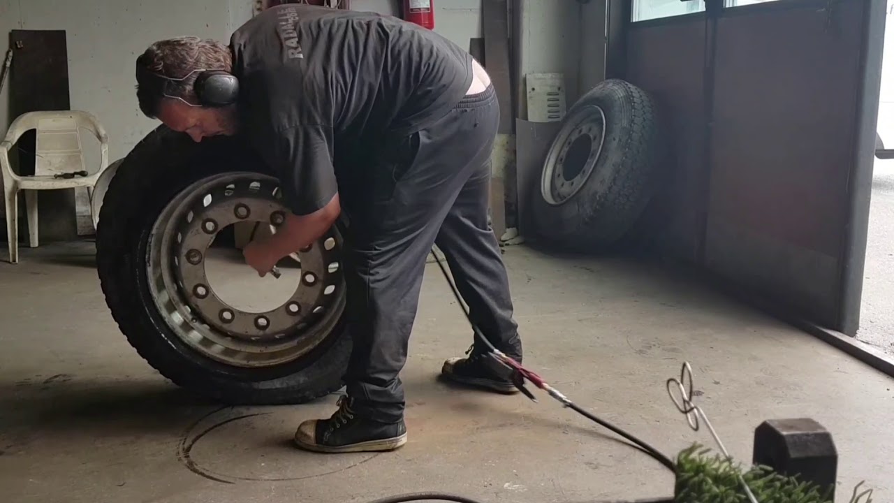 Truck tire stretching 275/70R22.5 on 11.75" wheel - YouTube