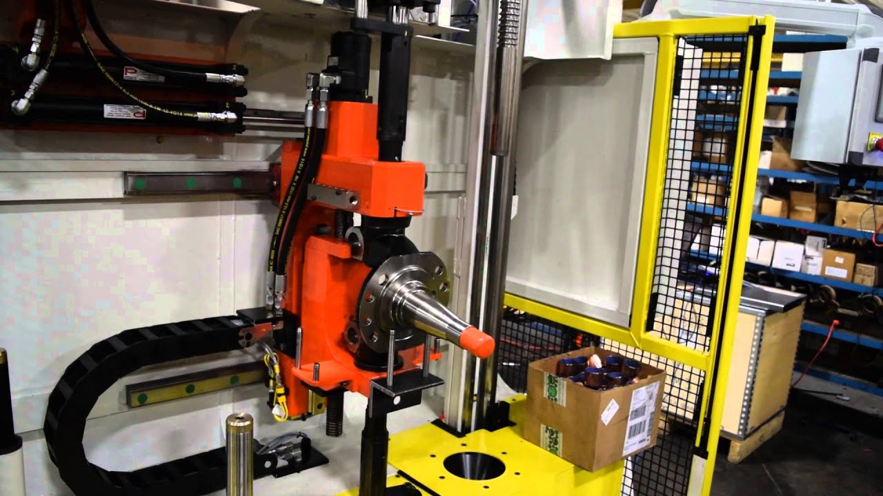 Knuckle Bushing Press & Broach Station - YouTube